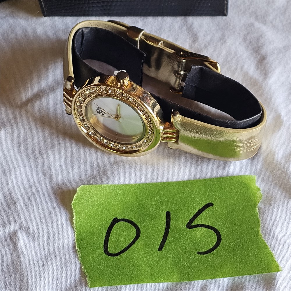 Blazing Auctions - Vintage ELIZABETH TAYLOR White Diamonds Gold Tone ...